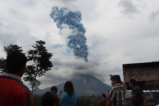 Volcano erupts for third time covering Indonesian villages in gray ash