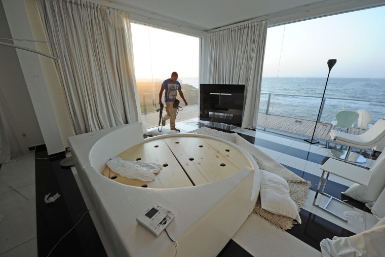 Abandoned Gadhafi homes reveal luxurious lifestyle