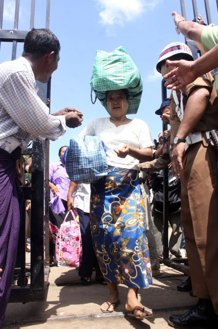 Myanmar eases iron-fisted rule, begins releasing prisoners