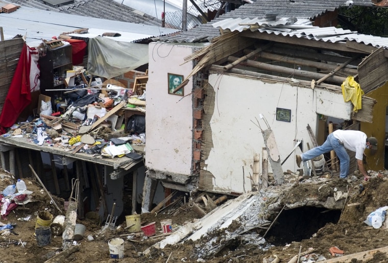 Mudslide buries homes in Colombia, at least 37 die