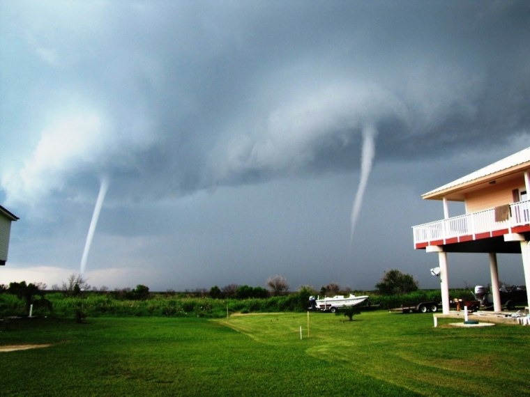 Scientist catches rare twin waterspouts on camera