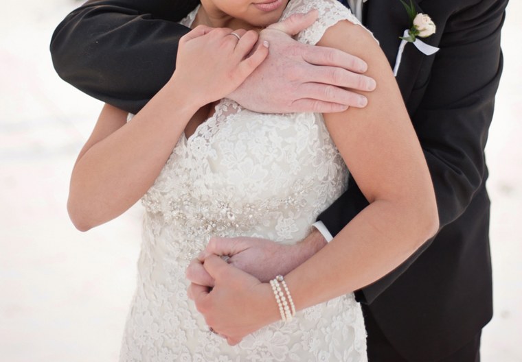 Couple ties the knot in a private winter wedding