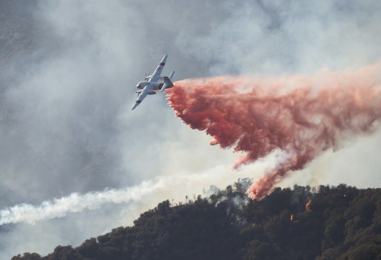 Wildfires burn Western states