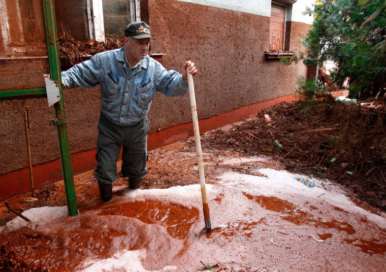 Toxic red sludge floods towns near Budapest