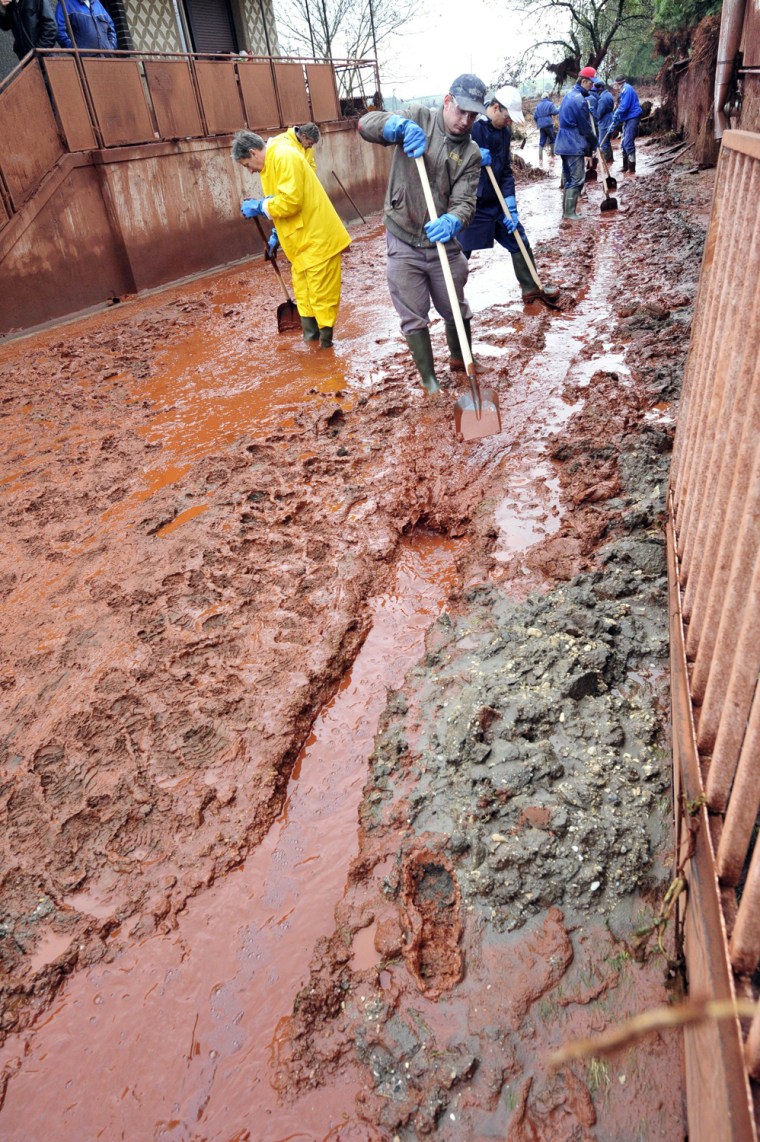 Toxic red sludge floods towns near Budapest