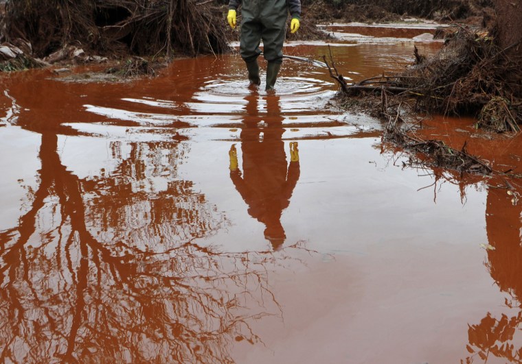 Toxic red sludge floods towns near Budapest