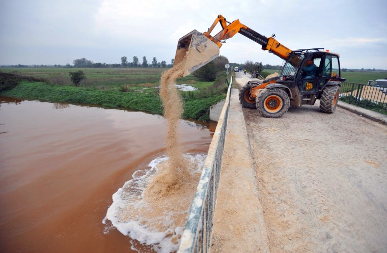 Toxic red sludge floods towns near Budapest