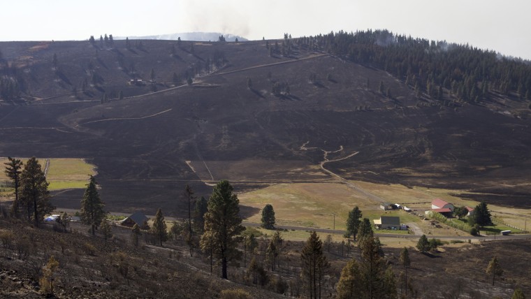 Wildfires burn Western states