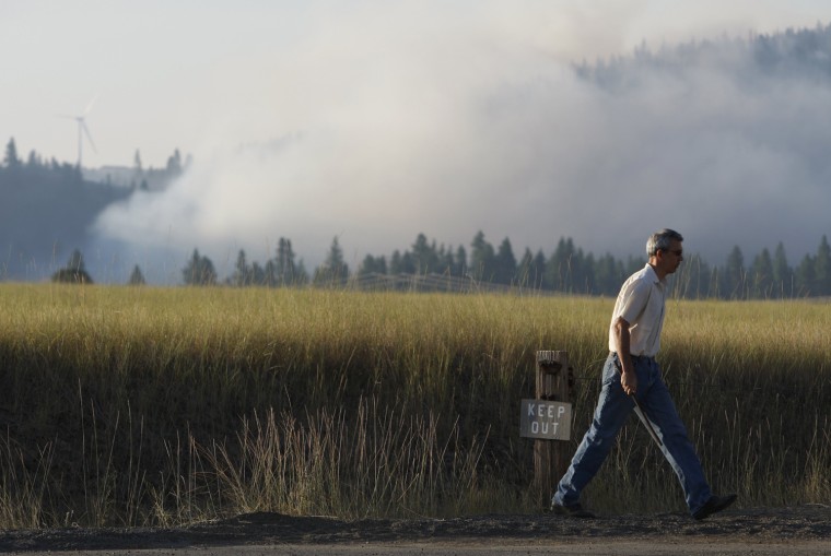 Wildfires burn Western states