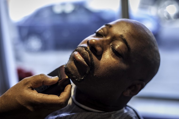 Image: Troy Staton has combined fine art with the art of barbering at ...