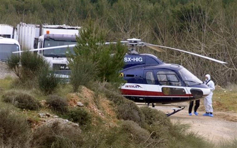Greeks hunt for convicts who escaped by copter