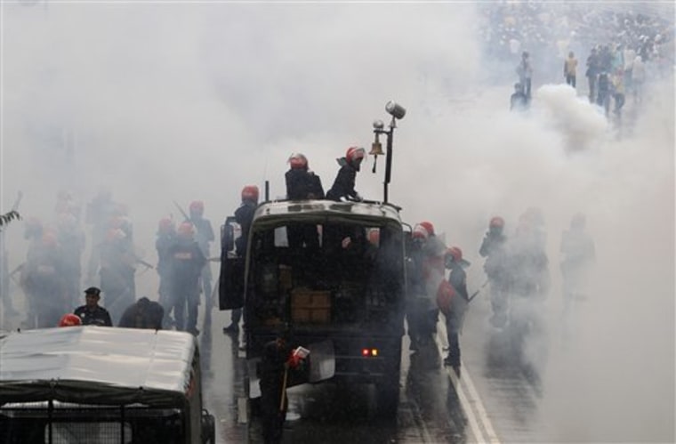 Malaysia police fire tear gas, arrest 1,600 at protest