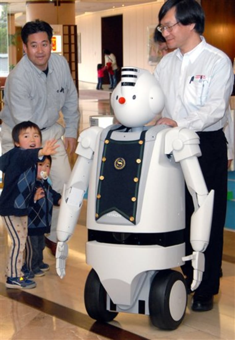 Hitachi unveils security robot on wheels