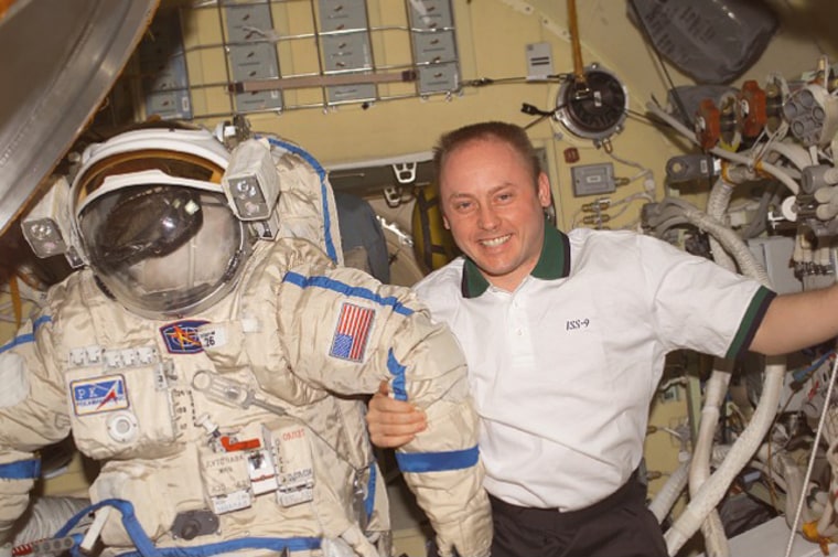 Spacewalker gets call from mom