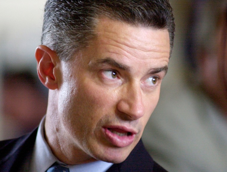 N.J.’s McGreevey defends decision to stay in office