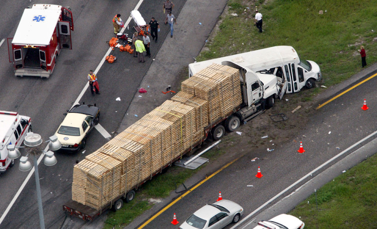 Tractor-trailer plows into bus carrying kids