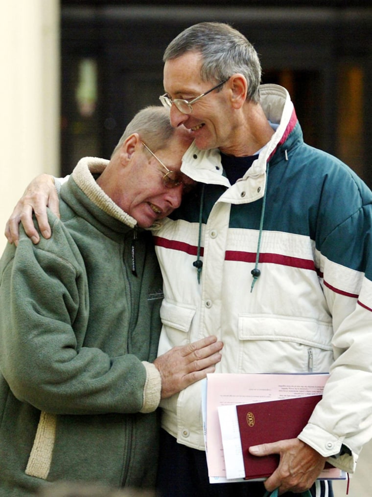 Britain allows gays to form civil partnerships