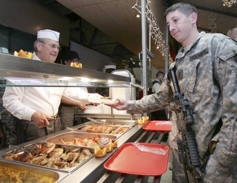 ‘Freedom prevails,’ Rumsfeld tells U.S. troops