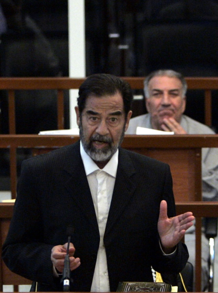 Saddam back in court as trial resumes