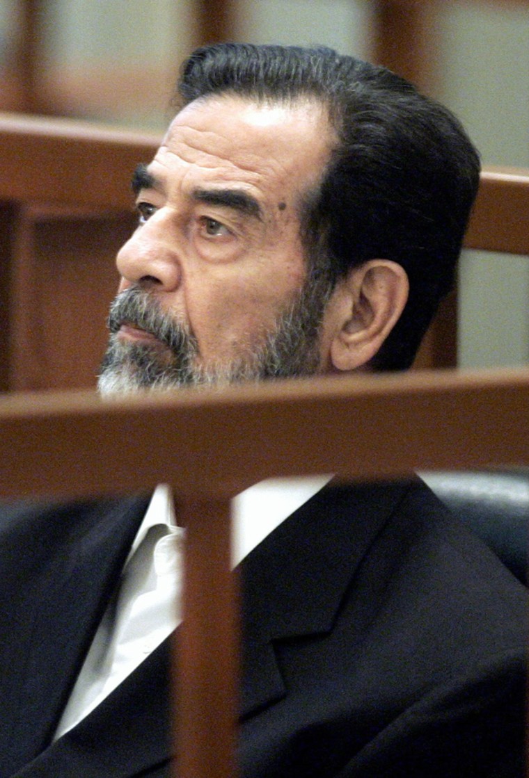 Defendant in Saddam trial tossed from court