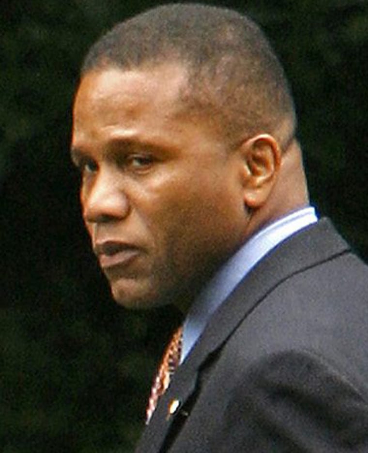Former Bush adviser in talks to avoid theft trial