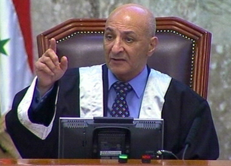 Saddam trial judge reportedly seeks asylum