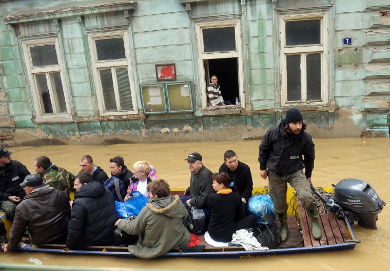 Floods in Bosnia Trigger Landslides; Thousands Flee High Water