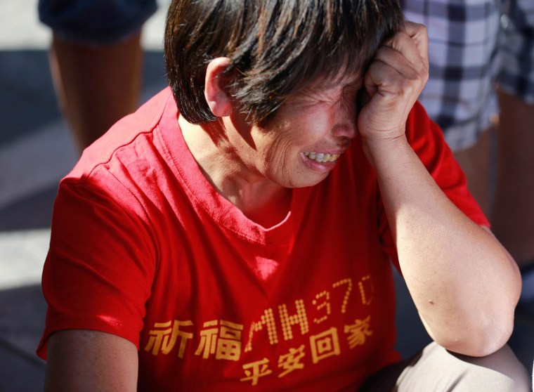 Distraught MH370 Families Mark Six Months Since Jet Vanished