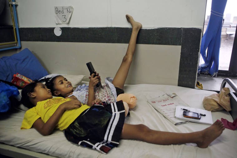 Two Girls, One Pair of Shoes: Nepal Earthquake Victims Bond