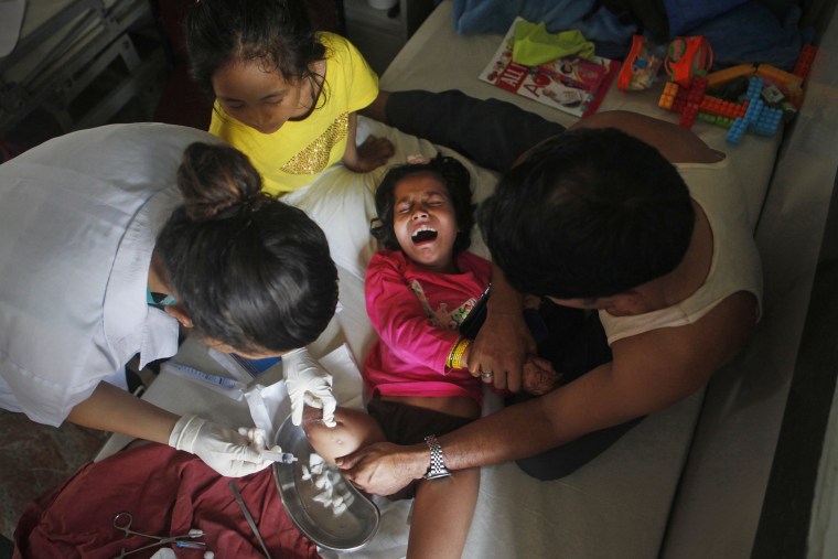 Two Girls, One Pair of Shoes: Nepal Earthquake Victims Bond
