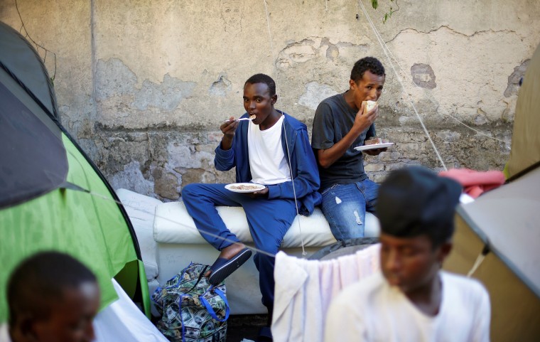 Tempers Flare as Temperatures Soar at Rome's 'Gloomy Street' Migrant Center
