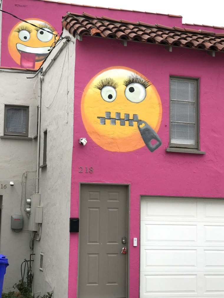 Hot pink 'emoji house' causes neighborhood uproar, debate