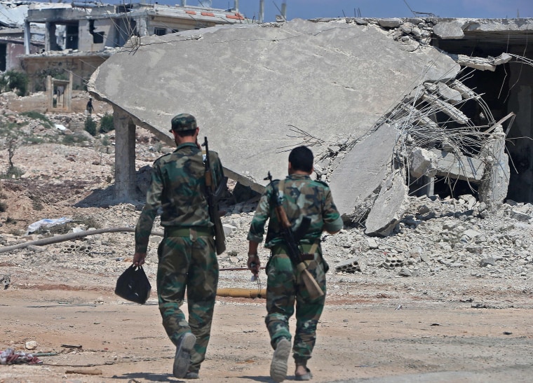Militants pull out of key town in Idlib as Russian-backed Syrian troops ...
