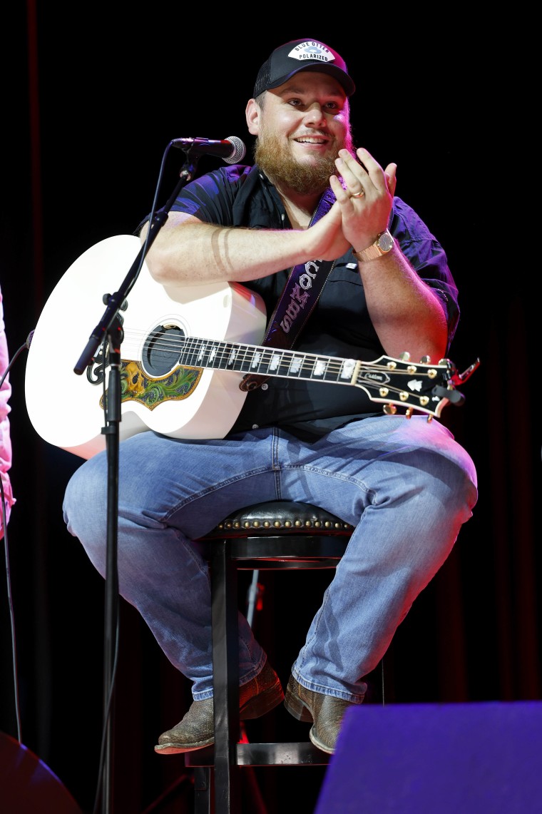 Glen Powell, 'Twisters' Cast Shotgun Beers at Luke Combs' Concert