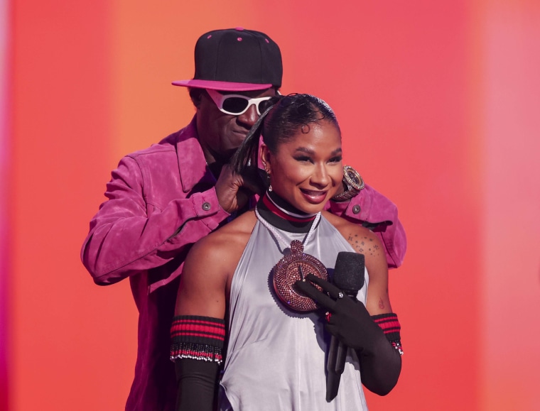 Flavor Flav Makes Jordan Chiles A Bronze Clock Necklace Amid Medal ...