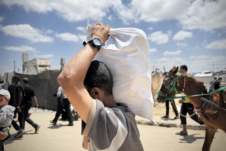 U.S.-backed aid group in Gaza reopens sites after closures and delays