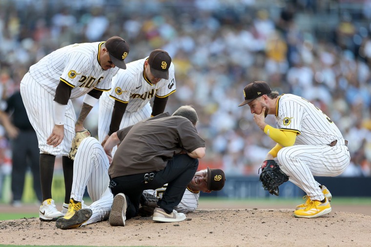 Padres reliever Jason Adam carted off the field with ruptured ...