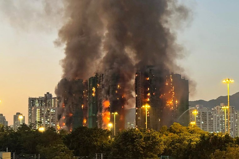 Hong Kong fire engulfs high-rise housing estate, killing at least 36