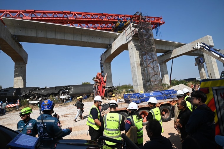 Construction crane falls on a passenger train in Thailand, killing at ...