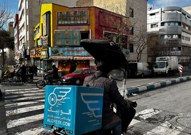 Iranians return to daily life in a capital scarred by deadly protests