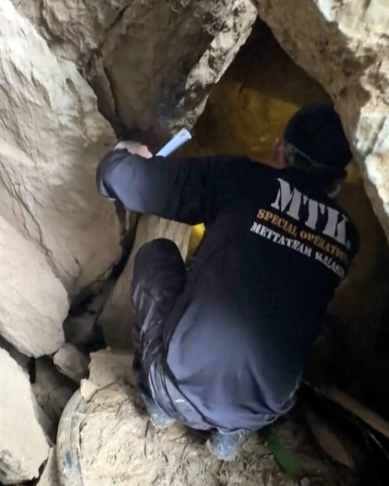 Rescuers race to reach 7 trapped in a Laos cave after flash floods ...