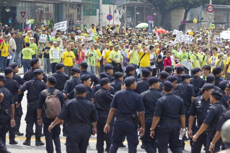 Tear gas, water cannon fired at reform protesters in Kuala Lumpur