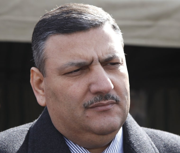 Syria premier defects to anti-Assad opposition, spokesman says