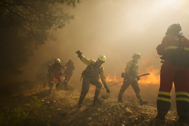 Spain fights raging wildfires, firefighting budgets cut