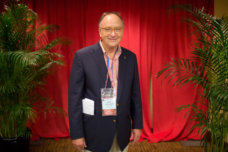 With convention's formalities canceled for a day, delegates carry on