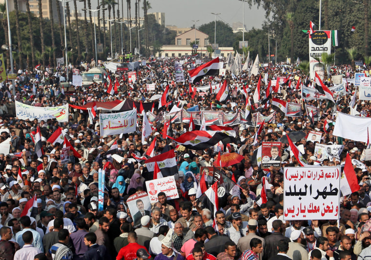 Dueling demonstrations in Cairo as Islamists rally behind Morsi