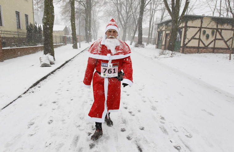 Santa stampede! Germans run in red suits and beards