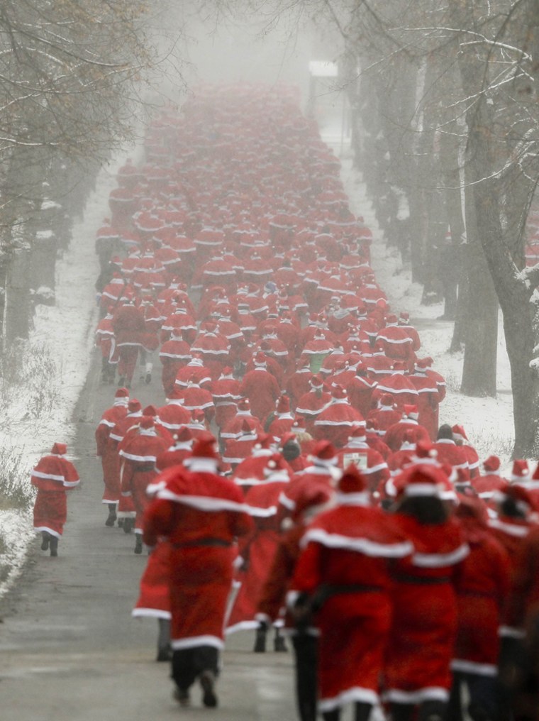 Santa stampede! Germans run in red suits and beards
