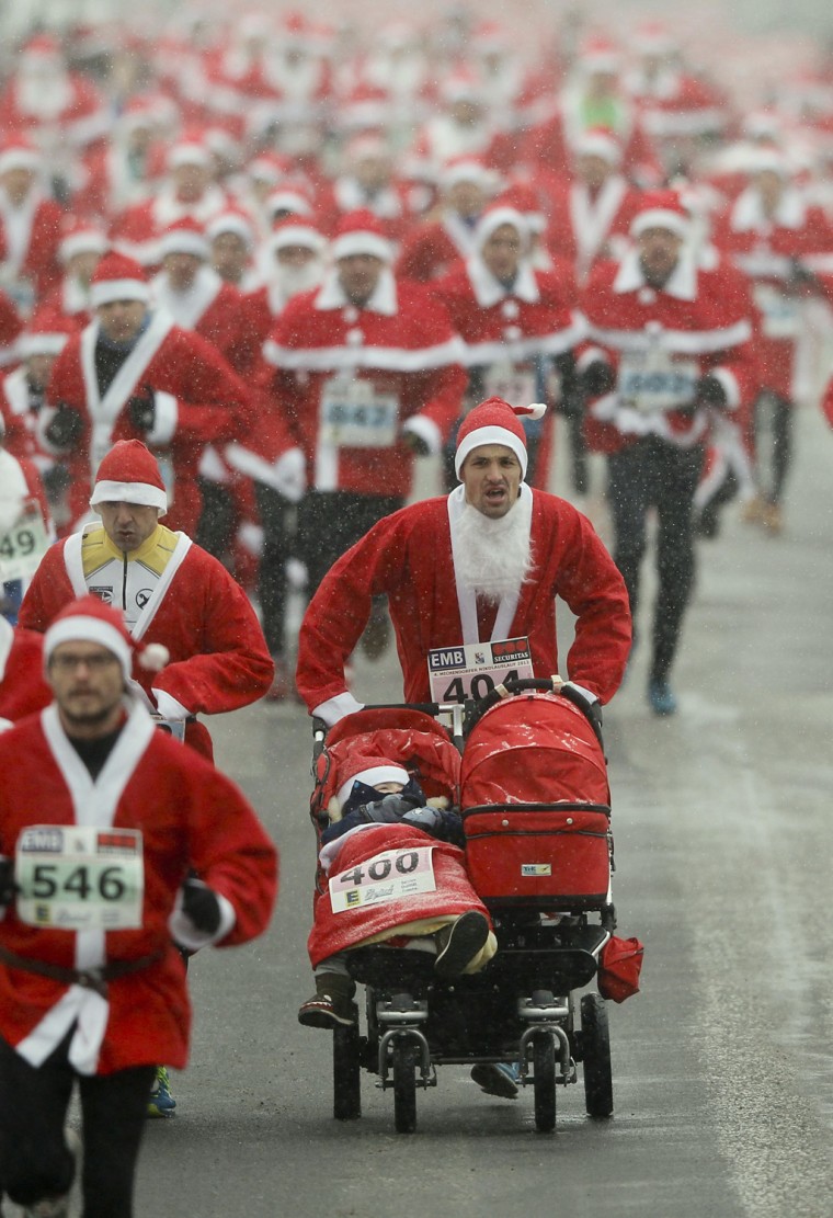 Santa stampede! Germans run in red suits and beards