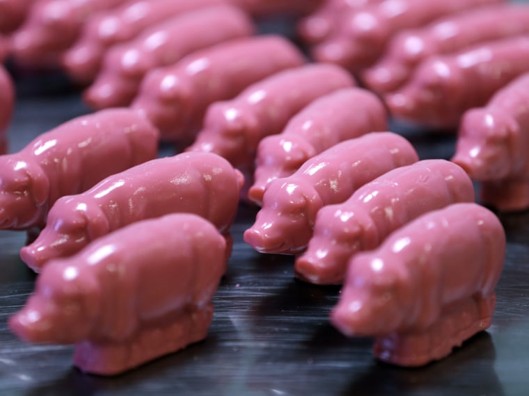 Holiday bash: Town pummels peppermint pigs for holidays